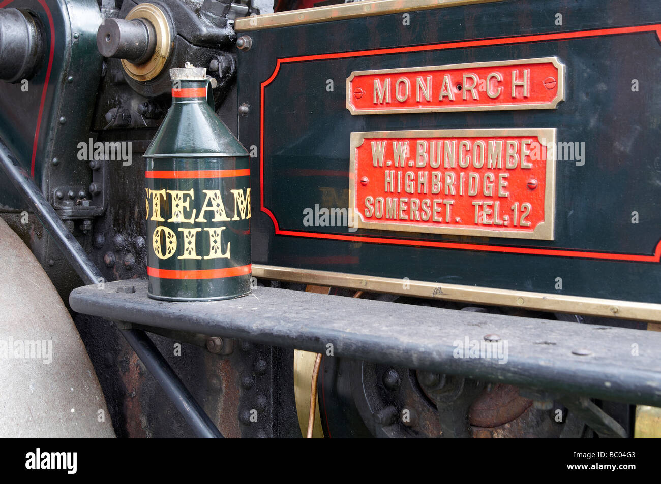 Bottle of steam oil ready to lubricate steam roller Monarch at a steam ...
