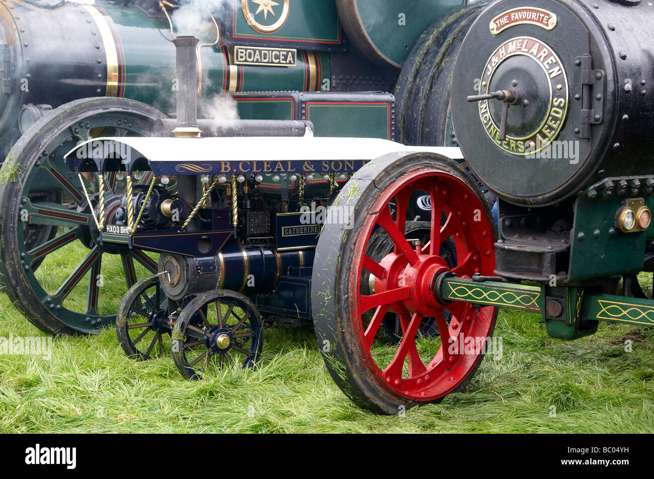 Two full size traction engines with a working model steam engine ...