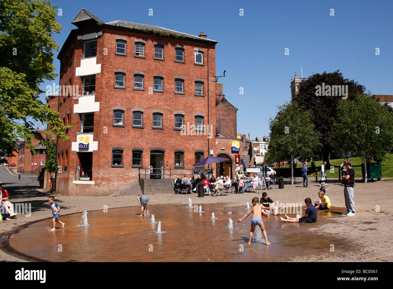 children playing in the quayhead square water fountain near st andrews ...