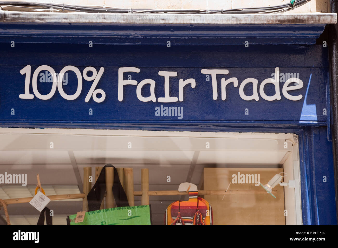 England UK Europe Sign above Fairtrade shop selling 100 fair trade ...