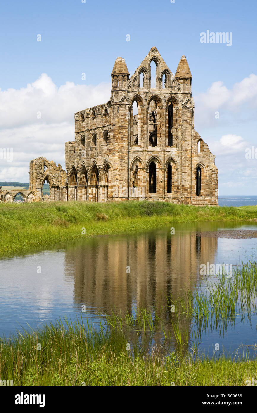 The ruins of Whitby Abbey reflected in the monastery lake, East Cliff ...