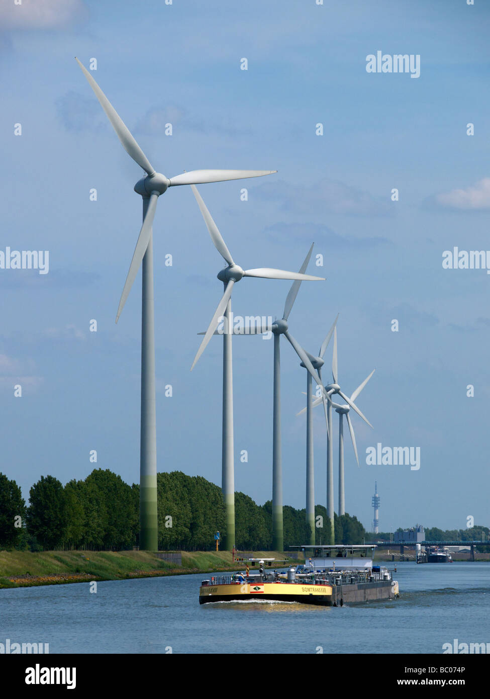 Line of modern windmills wind turbines in the Rotterdam port area Zuid ...