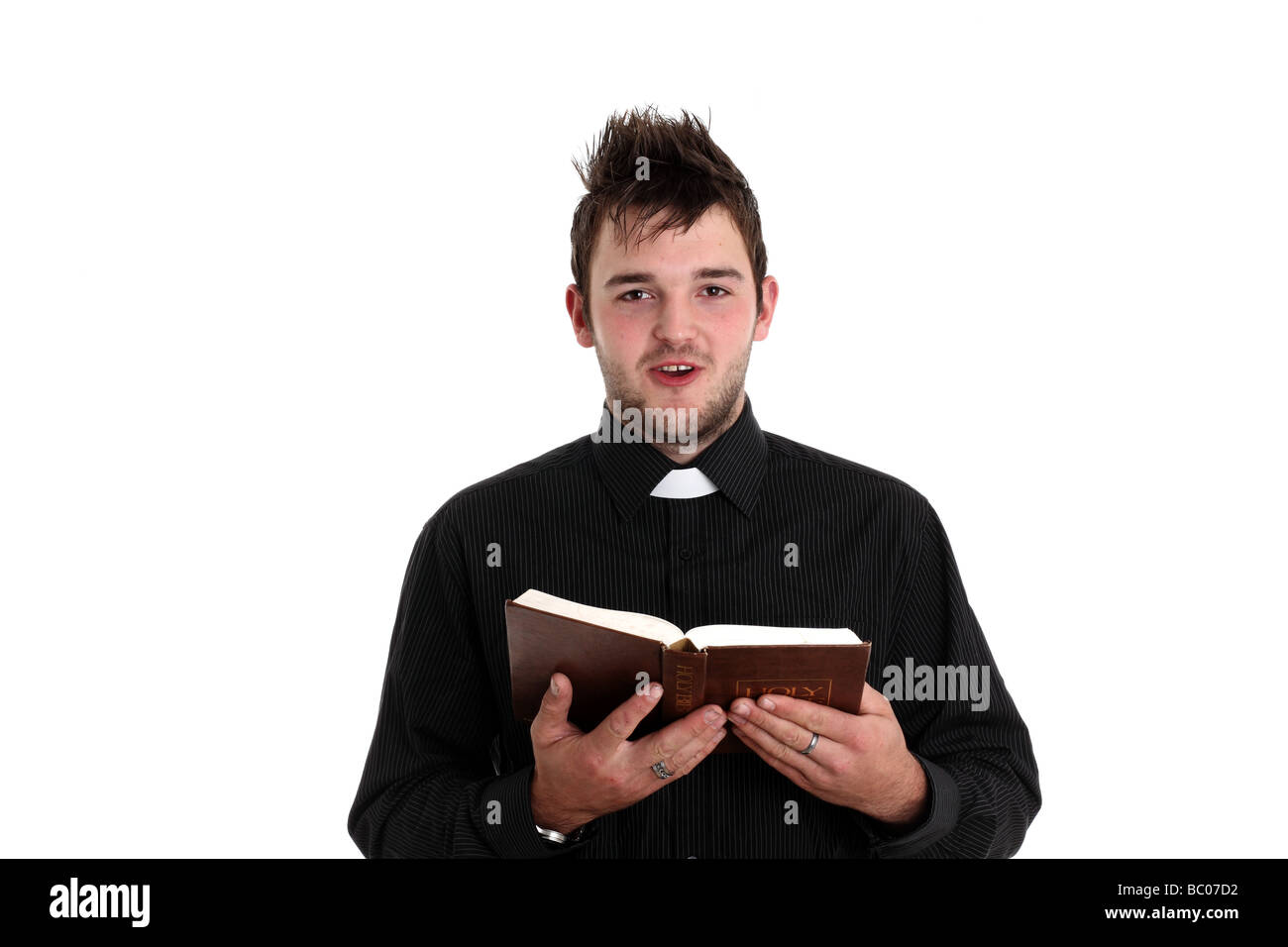 Young pastor preaching from his Bible, June 2009 Stock Photo - Alamy