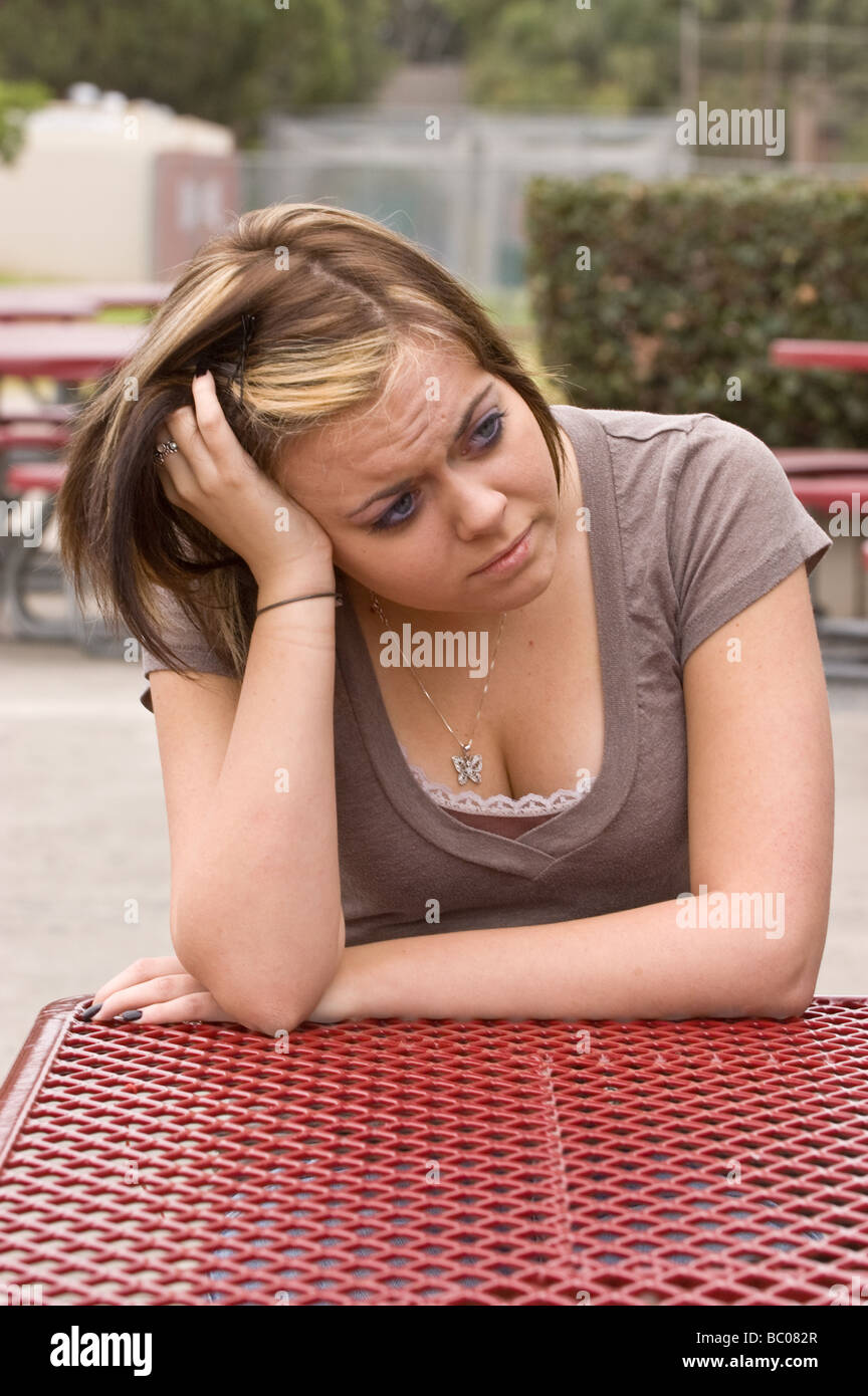 A frustrated high school student unsure how to deal with an issue Stock ...