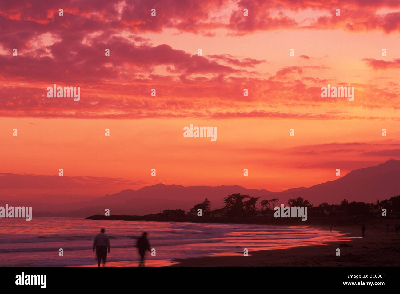 visitors stroll along Carpinteria State Beach at sunset Carpinteria ...