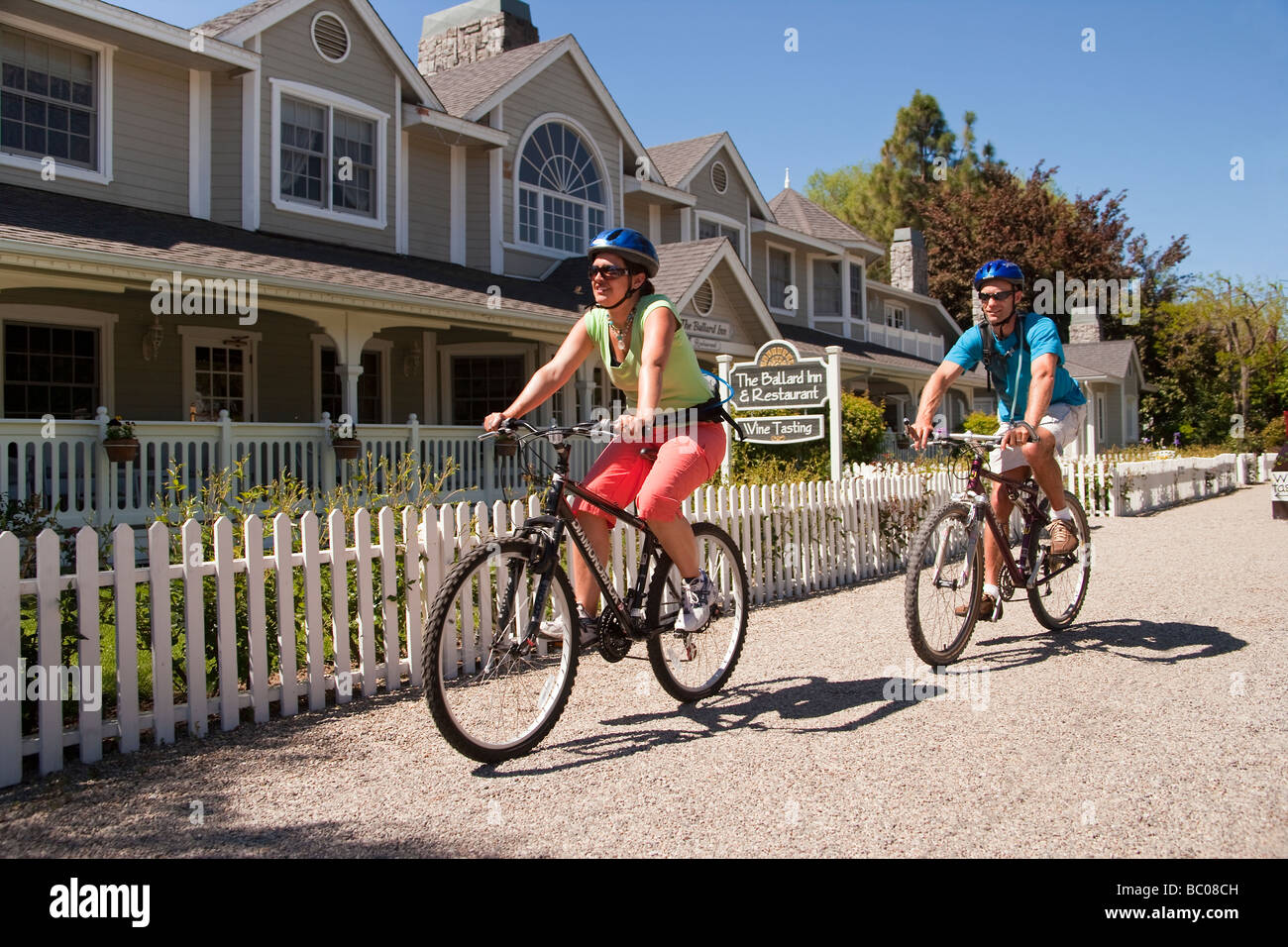 a couple on bicycles ride past The Ballard Inn and Restaurant Ballard ...