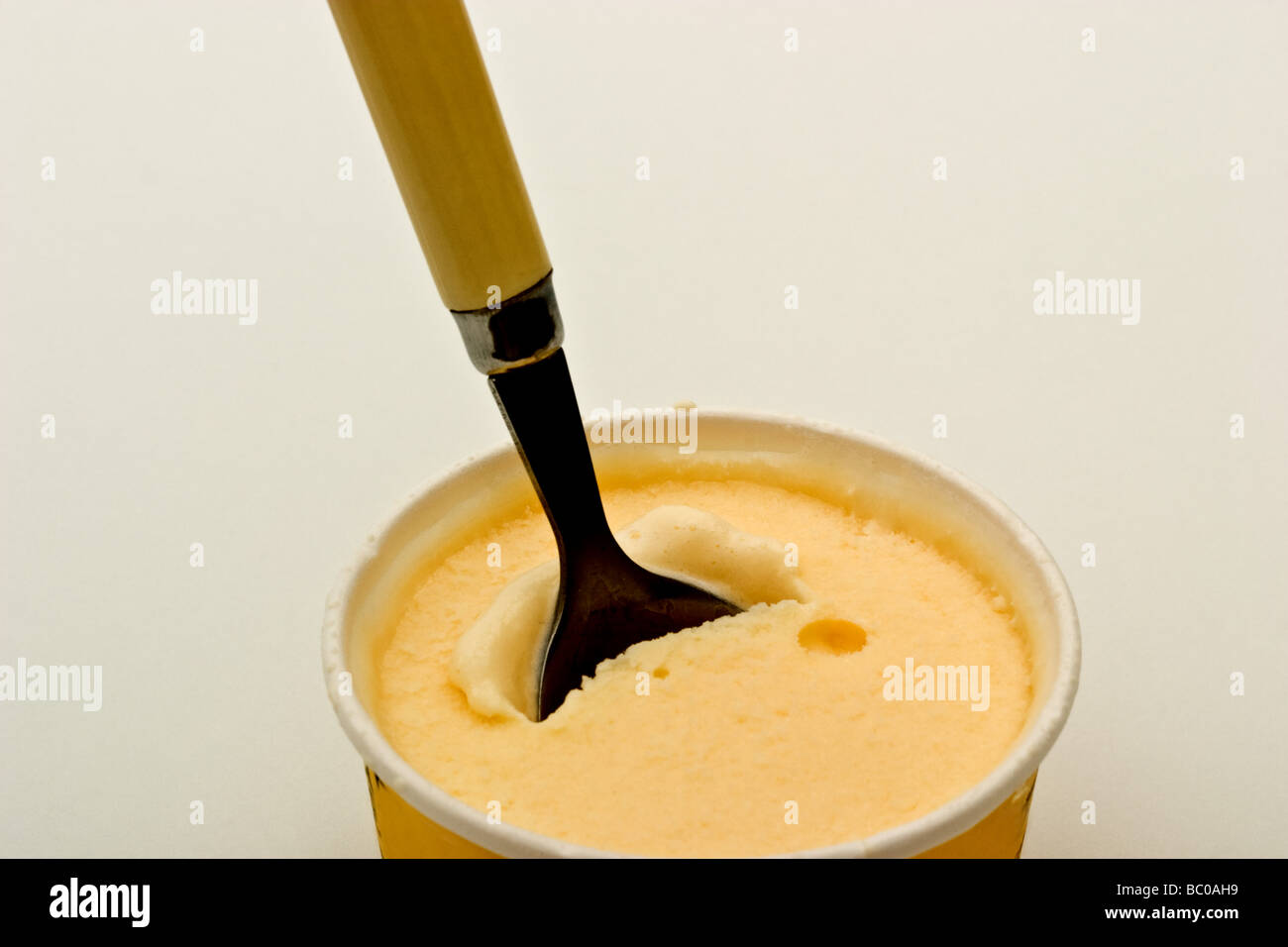 Ice cream tub spoon cutout hi-res stock photography and images - Alamy