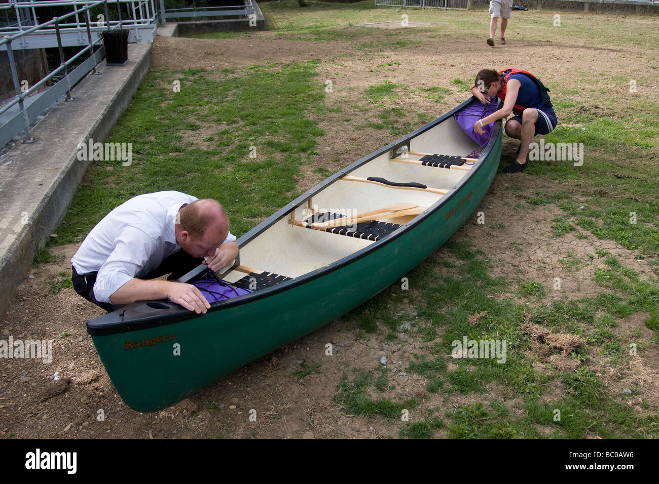 canadian canoeists fish pass canoeing canoe river medway kent england ...