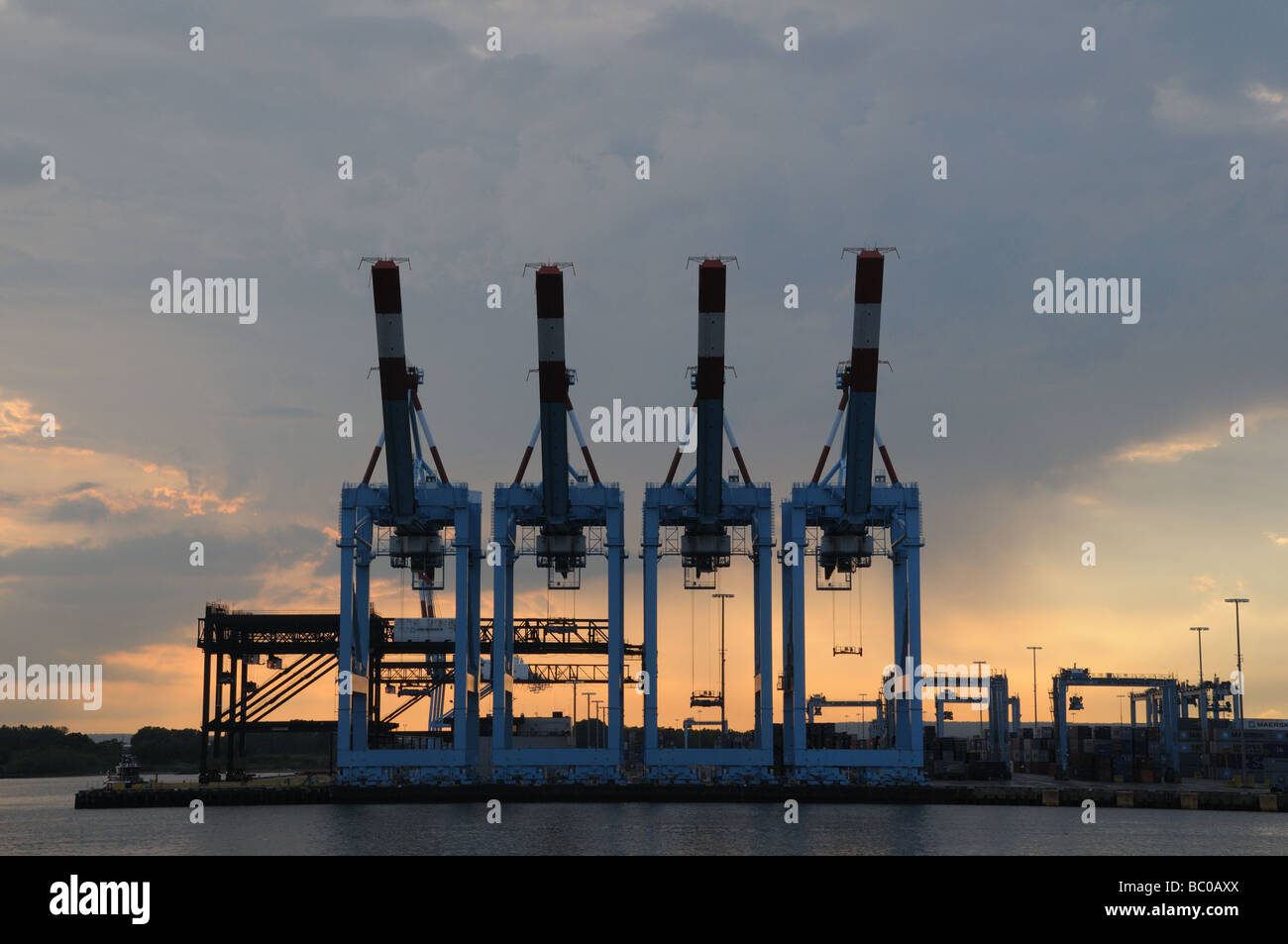 Gantries in New York harbor are used to unload containers from ships ...