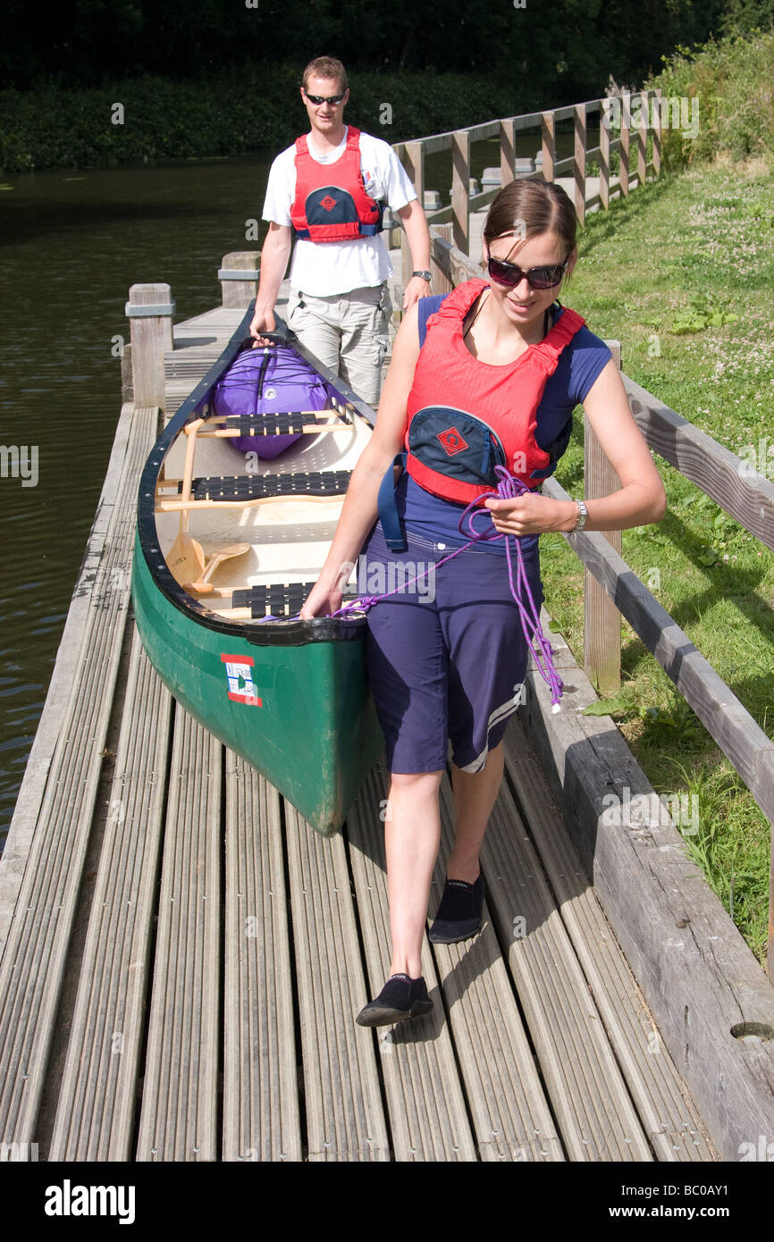 canadian canoeists fish pass canoeing canoe river medway kent england ...