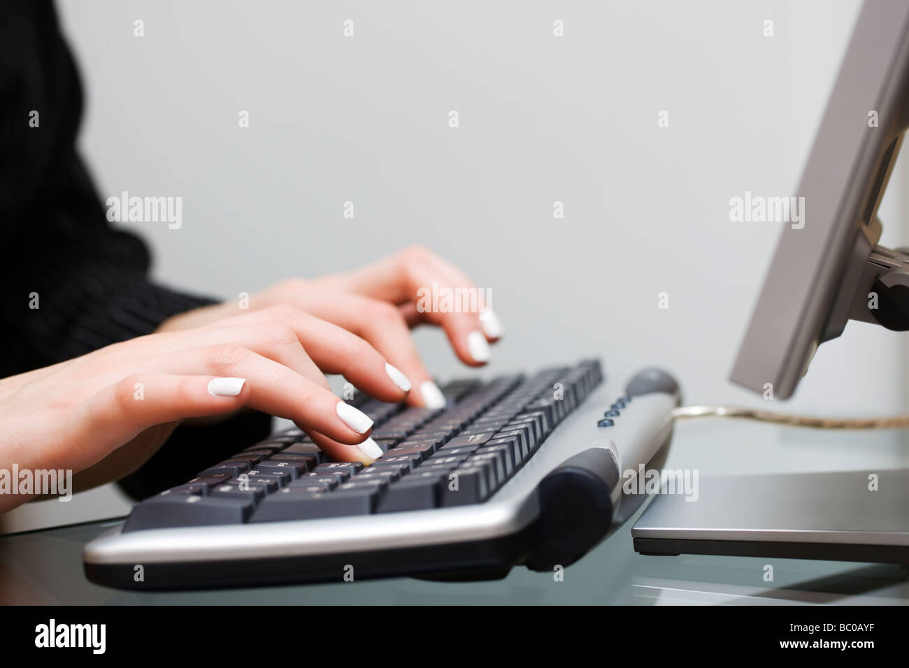 Female hands working on the computer Stock Photo - Alamy