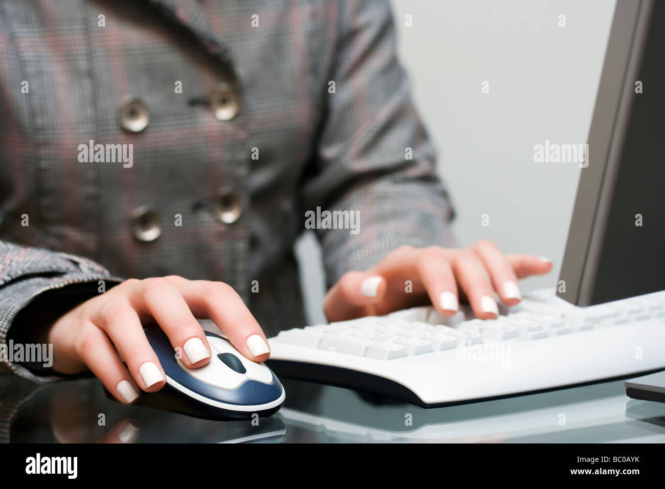 Female hands working on the computer Stock Photo - Alamy