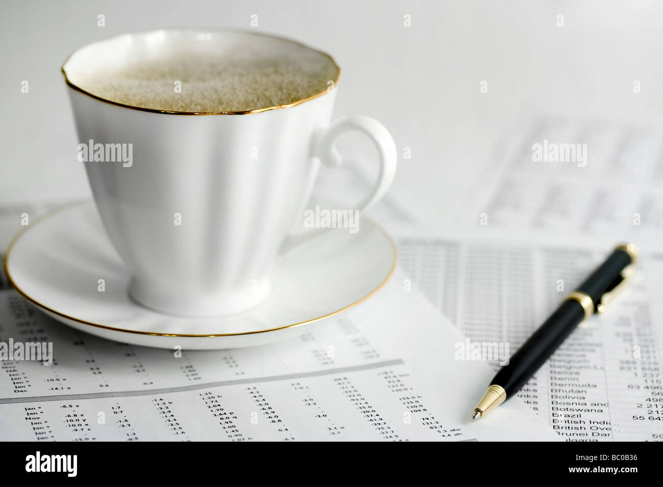 Coffee and accounting Stock Photo - Alamy