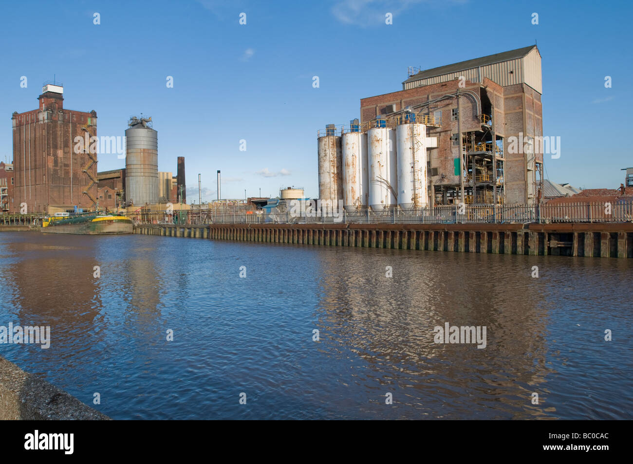 Disused and partly demolished factory building on the River Hull ...