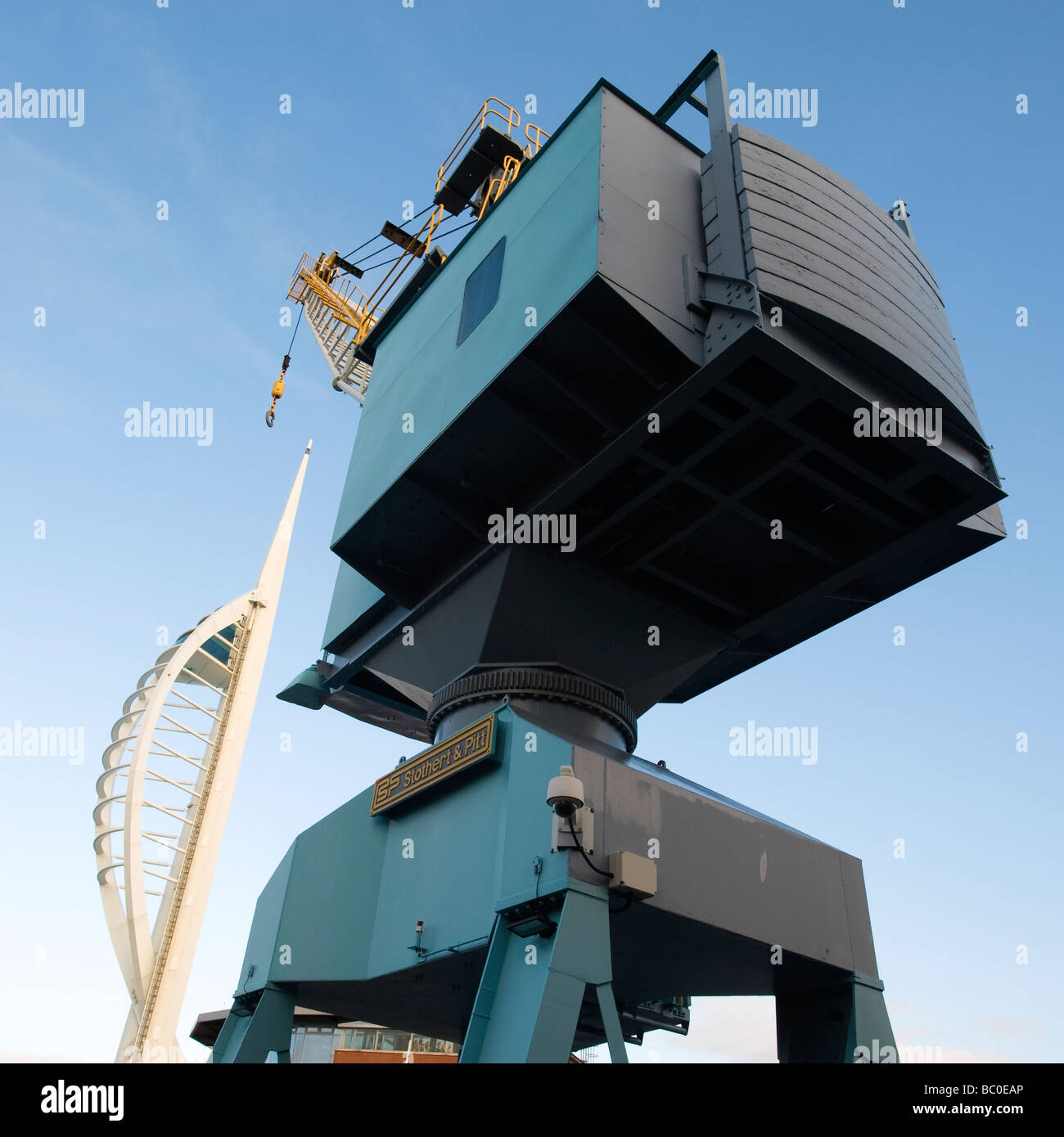 Historic crane and Spinnaker Tower at Gunwharf Quays, Portsmouth ...