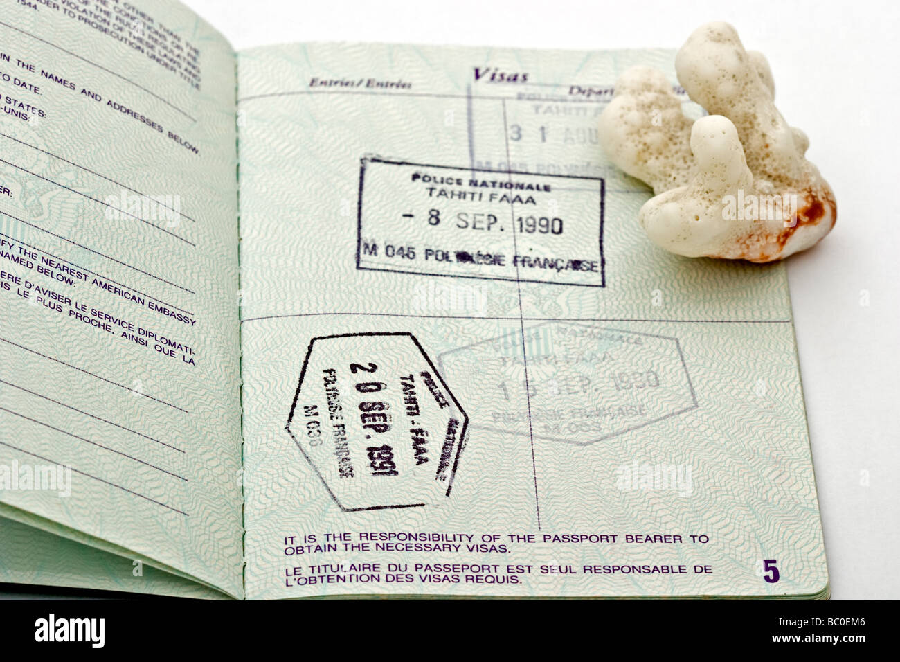 American passport with a Tahiti stamp and a small sea shell Stock Photo ...