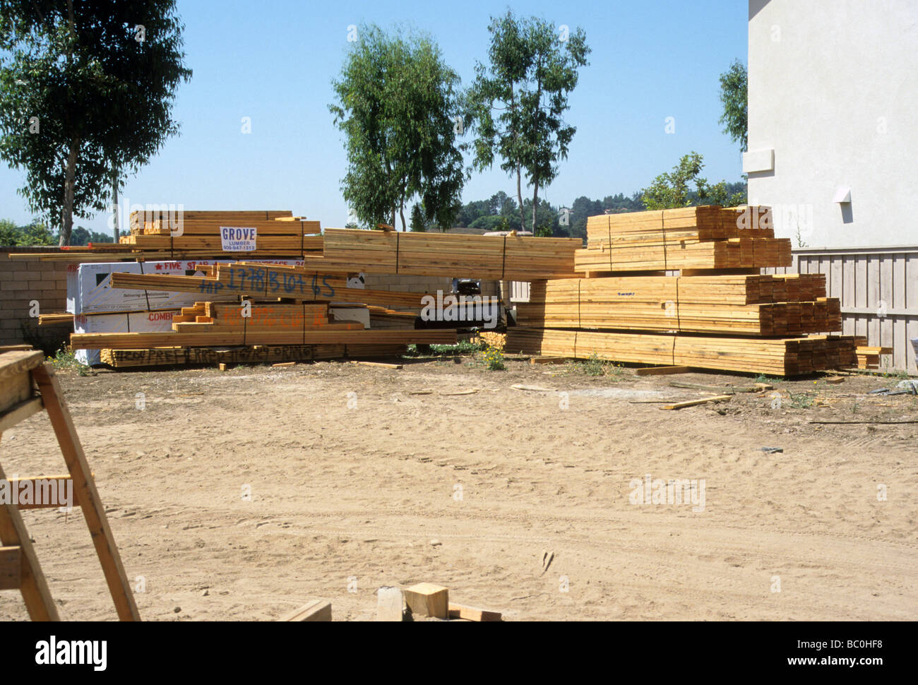 lumber build construct wood beam stud stack supply material house home ...