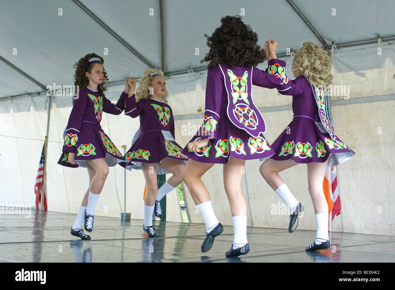 Four young girls performing a Celtic dance at a local Irish festival in ...