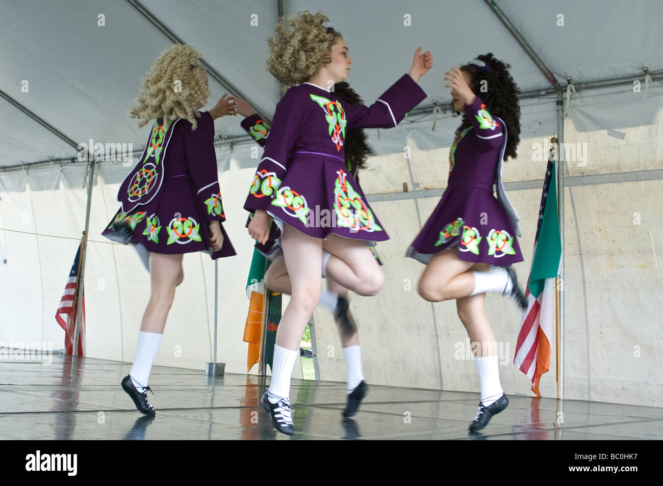 Four young girls performing a Celtic dance at a local Irish festival in ...