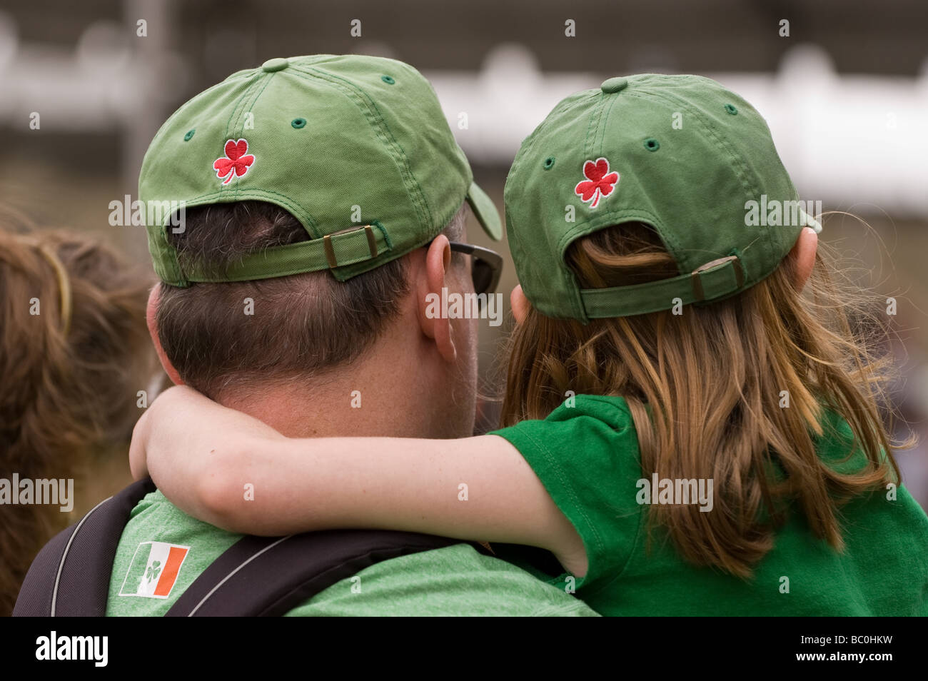 A father and daugher show their Irish pride through their hats at a ...