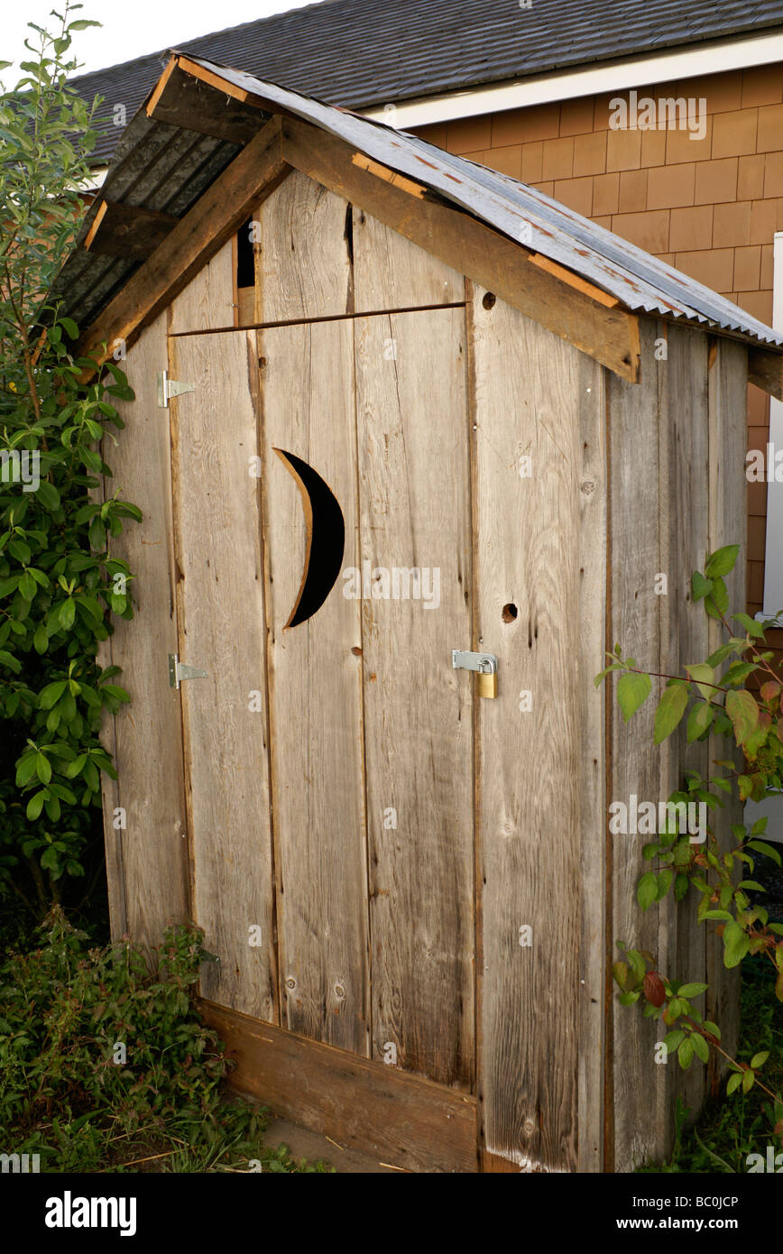 Old fashioned wooden outhouse Stock Photo - Alamy