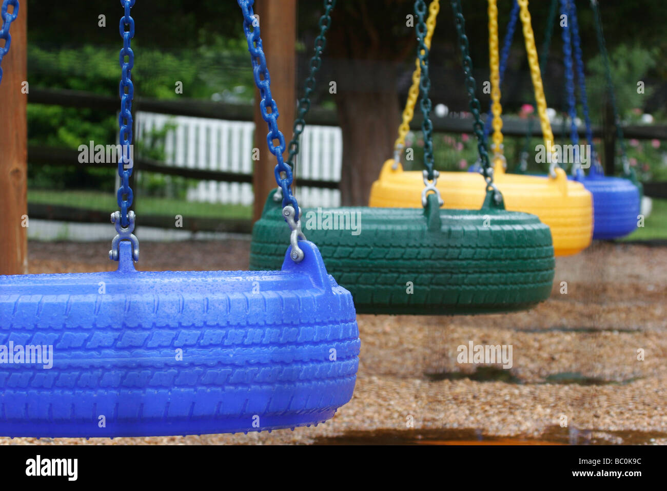 Colorful children's swing Stock Photo - Alamy