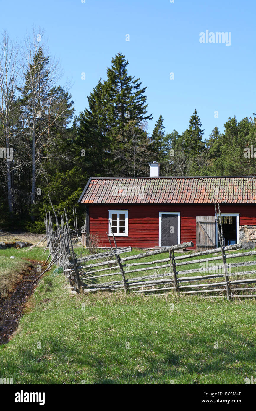 Old farm with red house and fence Stock Photo - Alamy