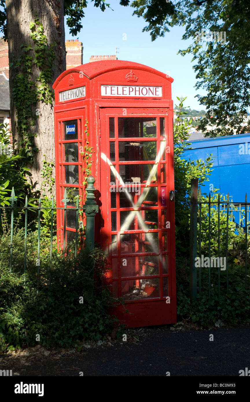A phone box vandalised and damaged about to be scrapped.color, colored ...