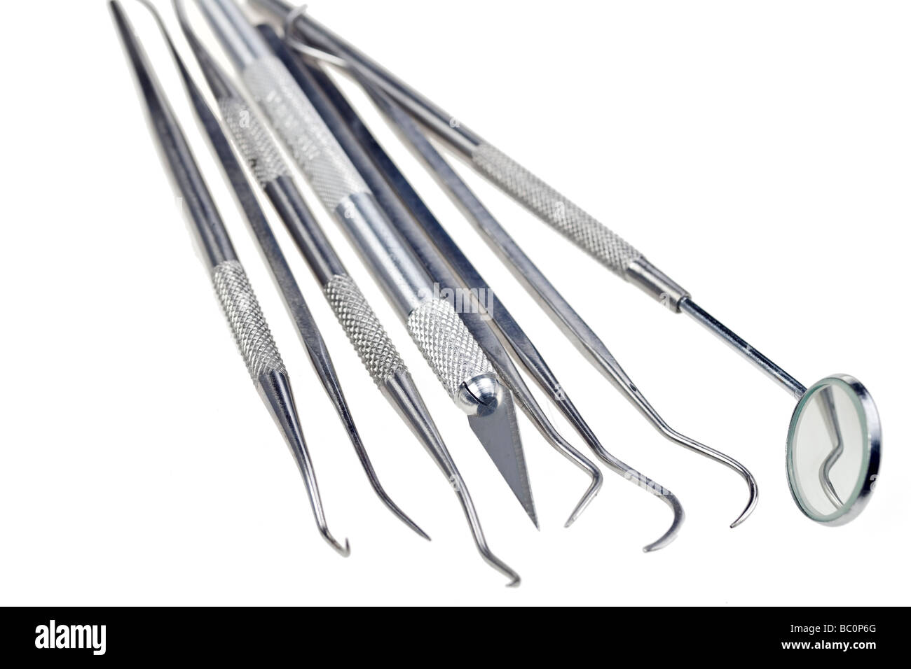 dentists tools isolated on a white background Stock Photo - Alamy