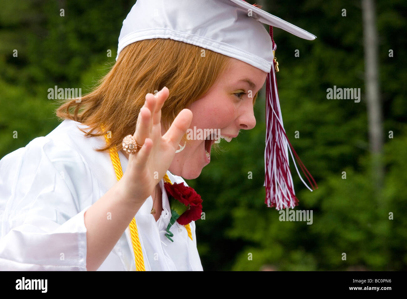 Graduation ceremony, female high school student in cap and gown Stock ...