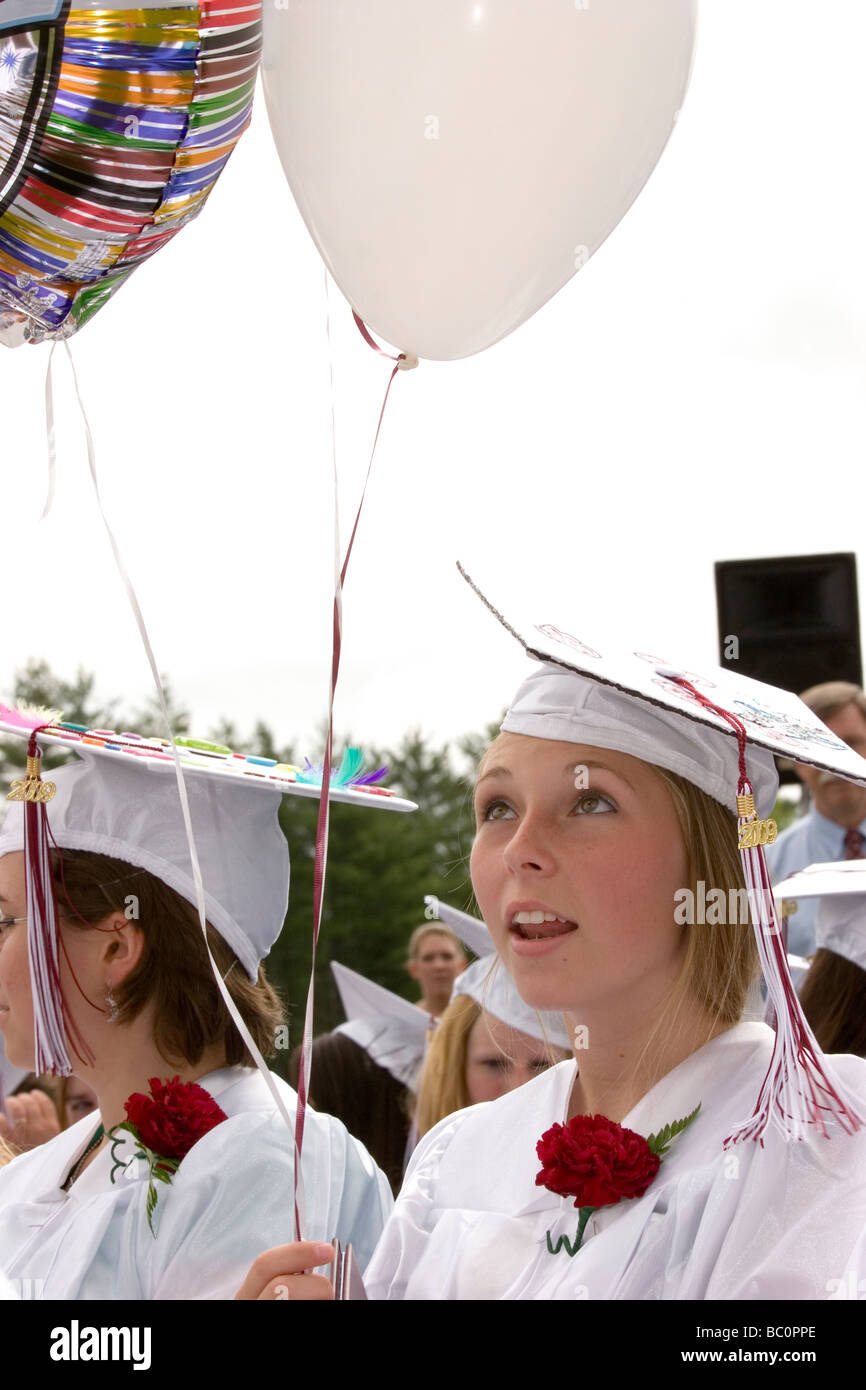 Graduation ceremony, female high school student in cap and gown Stock ...