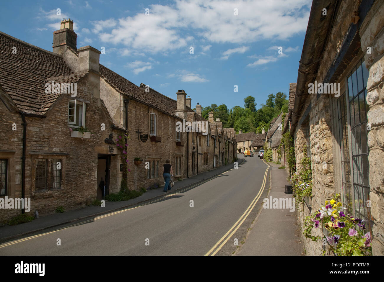 Main street through the pretty picturesque Cotswold village of Castle ...