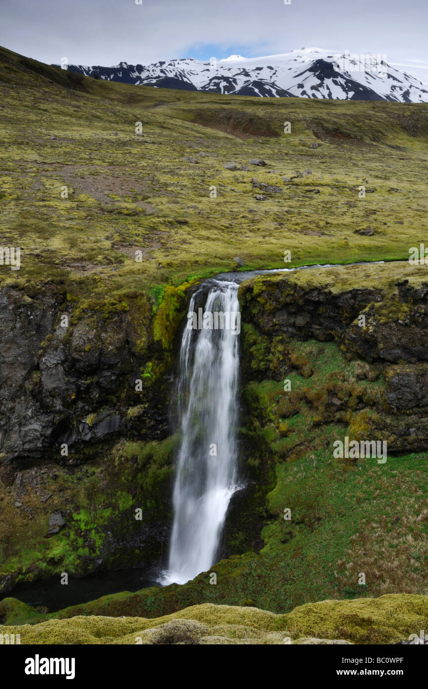 Waterfall on Skógá river Iceland with Eyjafjallajökull behind Stock ...