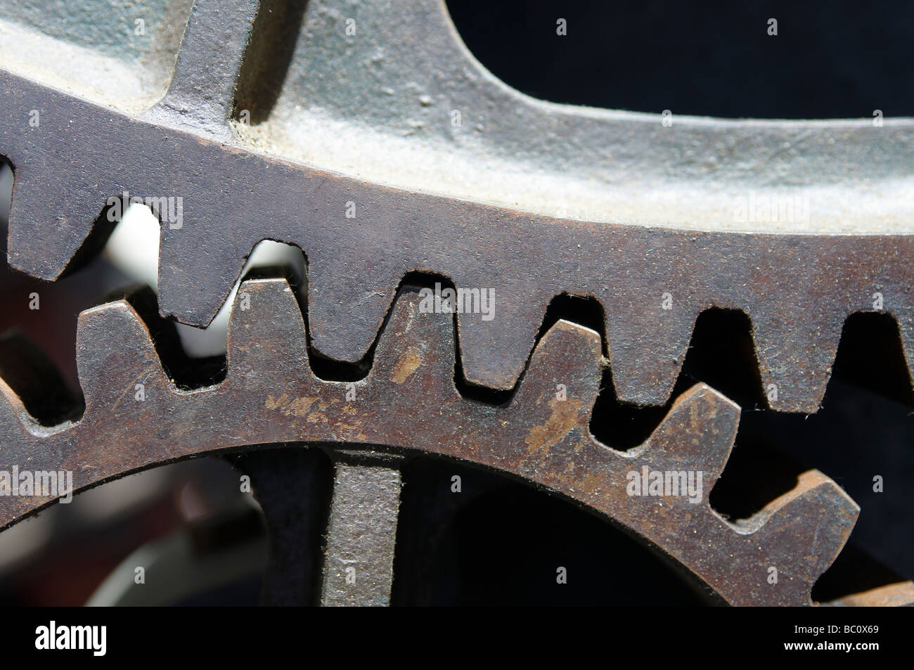 Large cog wheels meshed togoether Stock Photo - Alamy