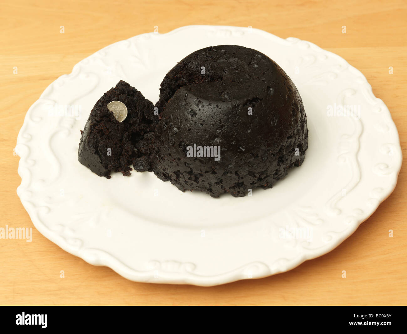 Traditional Christmas Pudding with a Silver Coin Stock Photo - Alamy