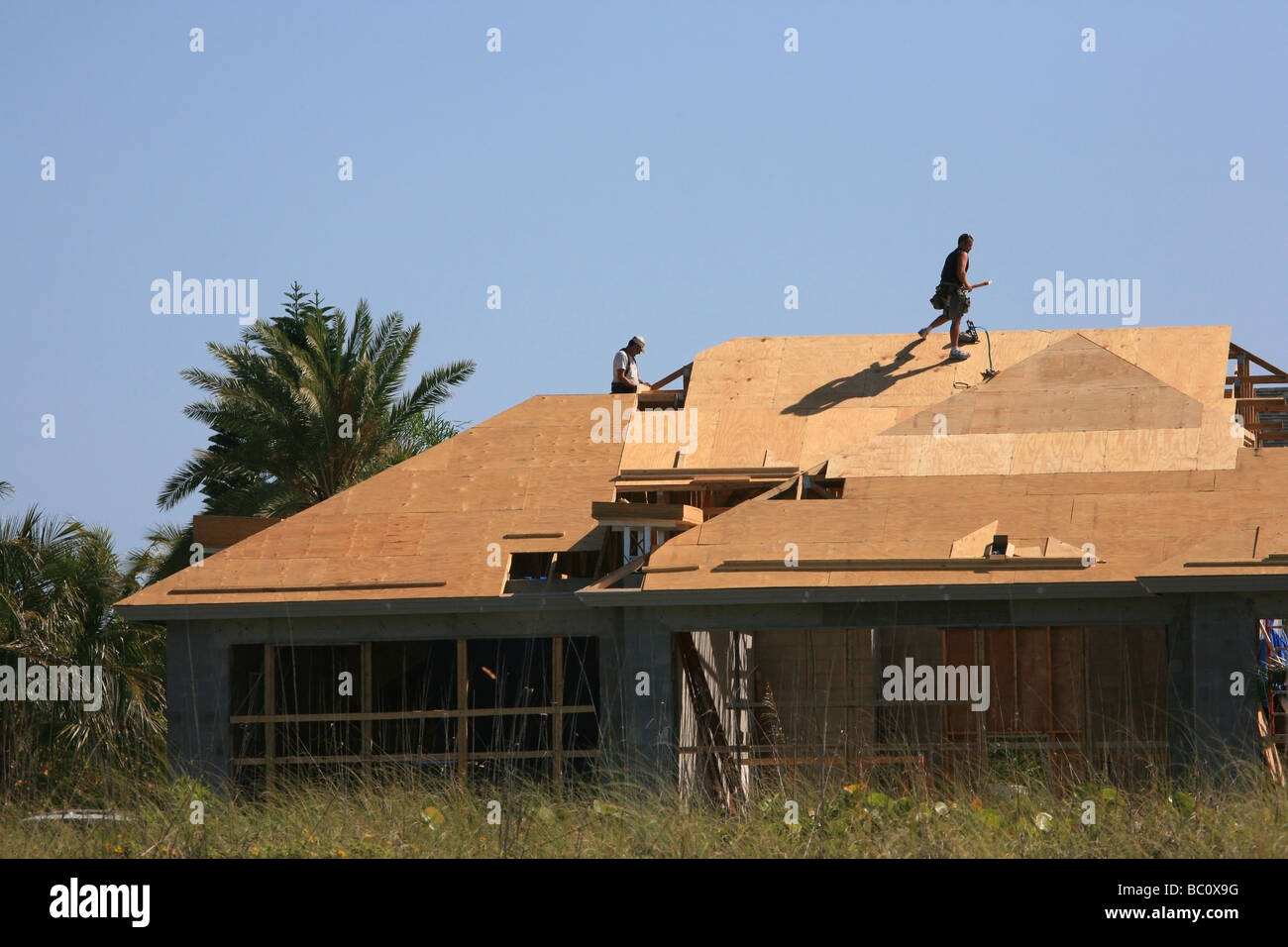Carpenters Working Roof House Stock Photos & Carpenters Working Roof ...