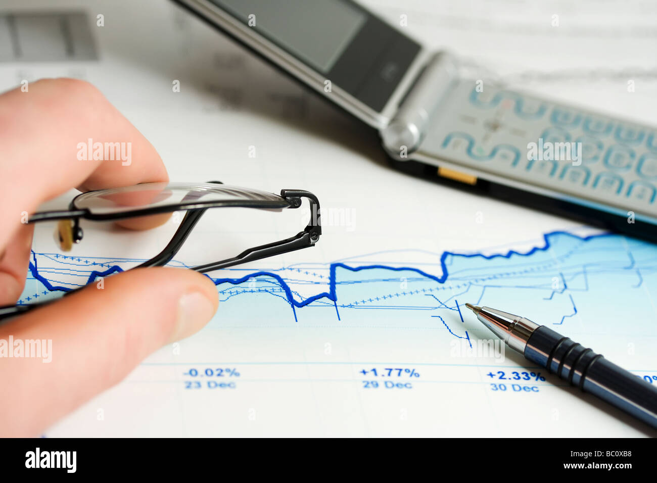 Analysis of stock market reports Stock Photo - Alamy