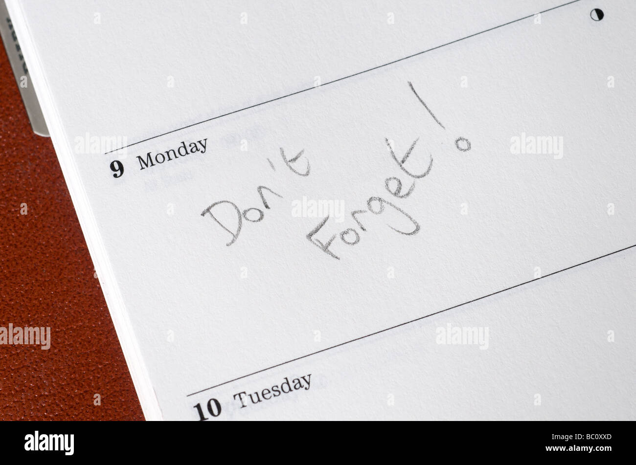Diary page saying 'Don't Forget' Stock Photo - Alamy