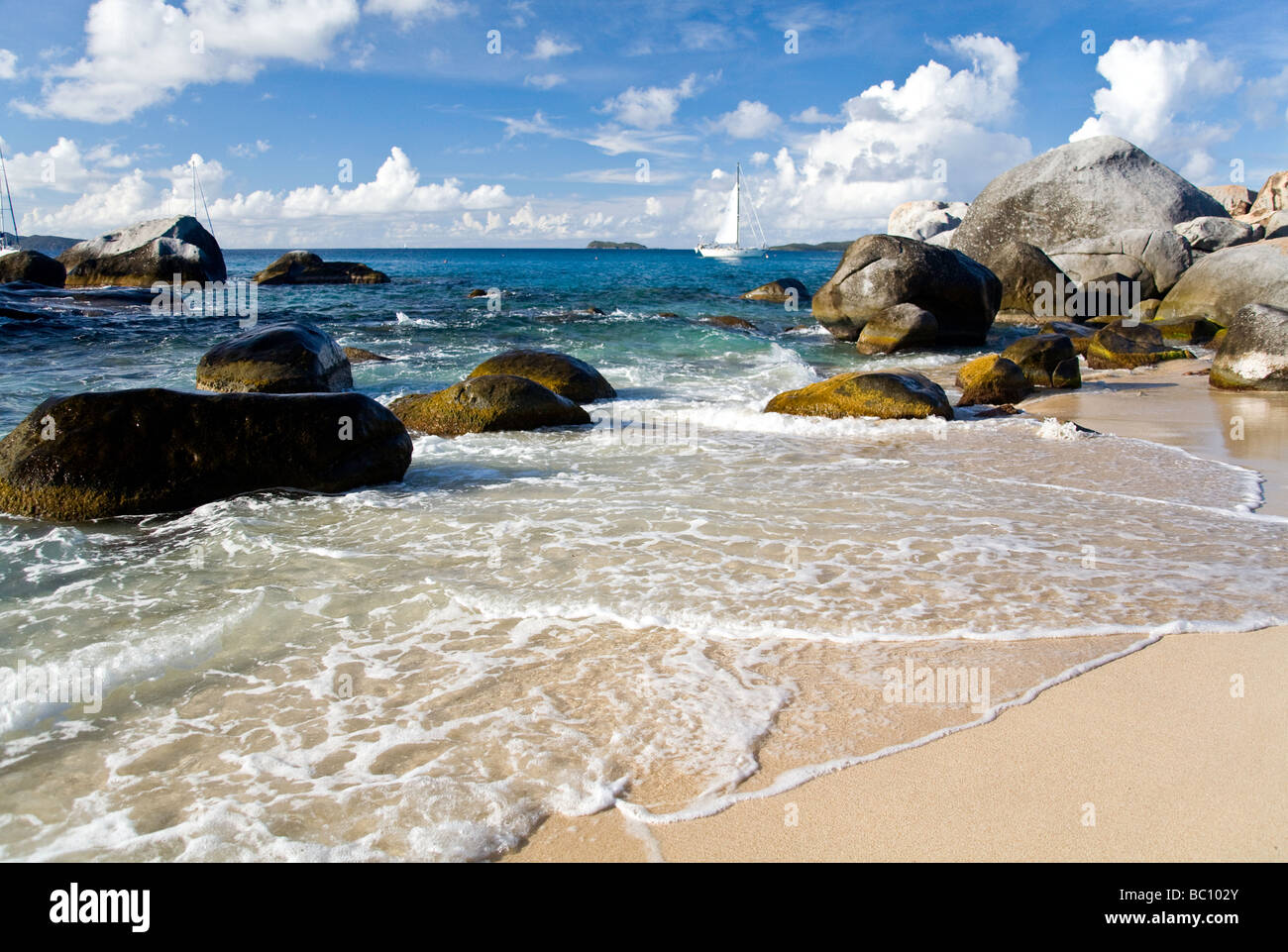 Beach, surf, and rocks at the Baths on Virgin Gorda, Tortola, British ...
