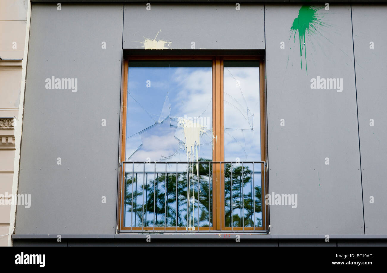 Fassade broken window paint bomb hi-res stock photography and images ...
