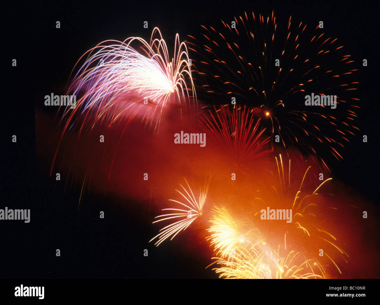 fireworks sky explode color spread flame spark rocket aerial Stock ...