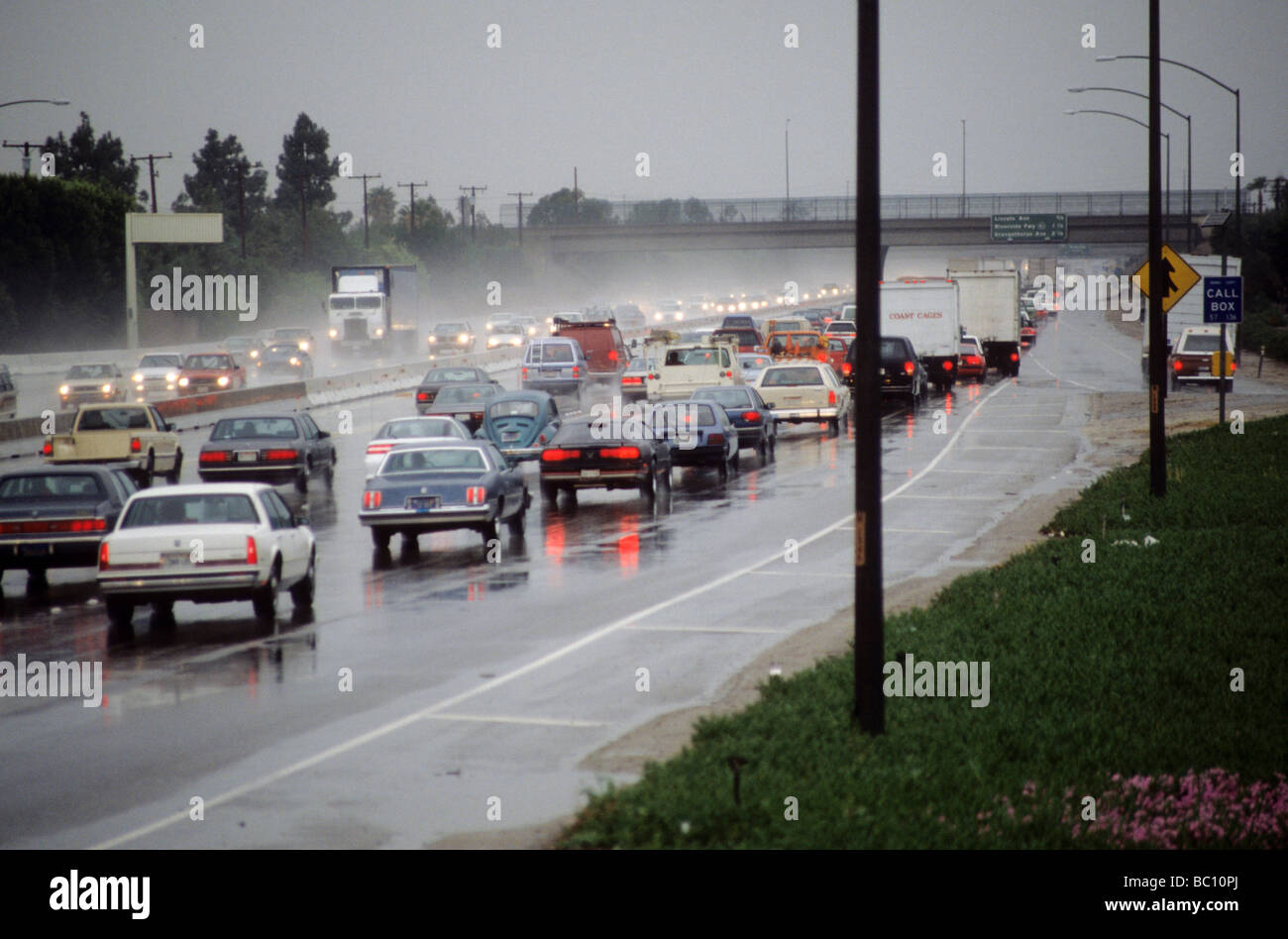 los angeles freeway rain skid wet weather tail light brake danger care ...