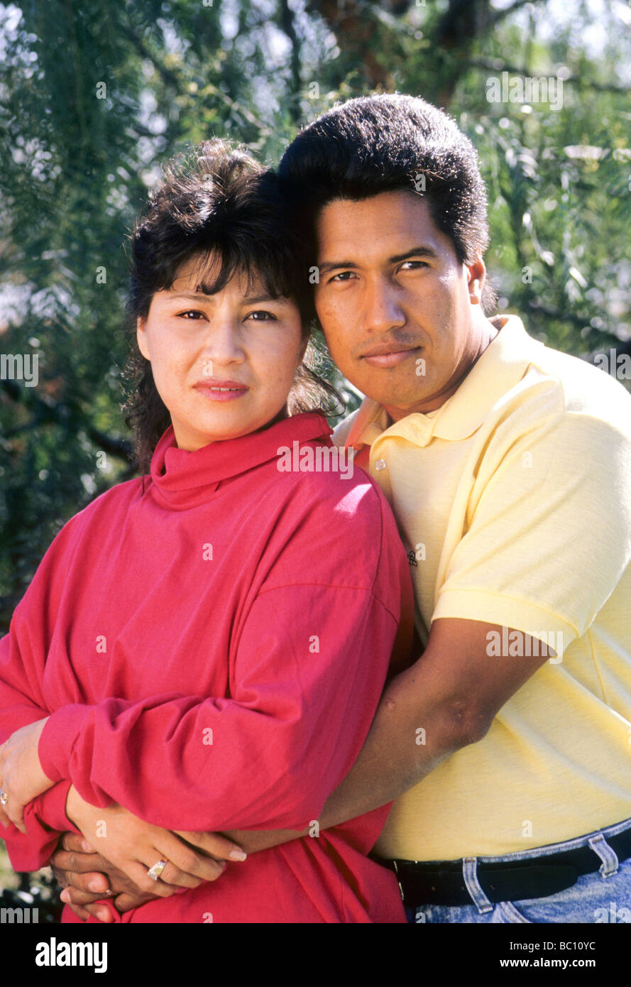 latin mexican hispanic american couple hug love touch serious Stock ...