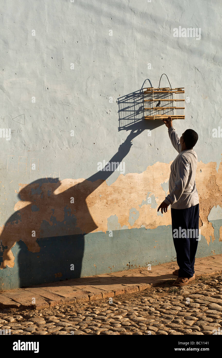 Person shadow and cage hi-res stock photography and images - Alamy