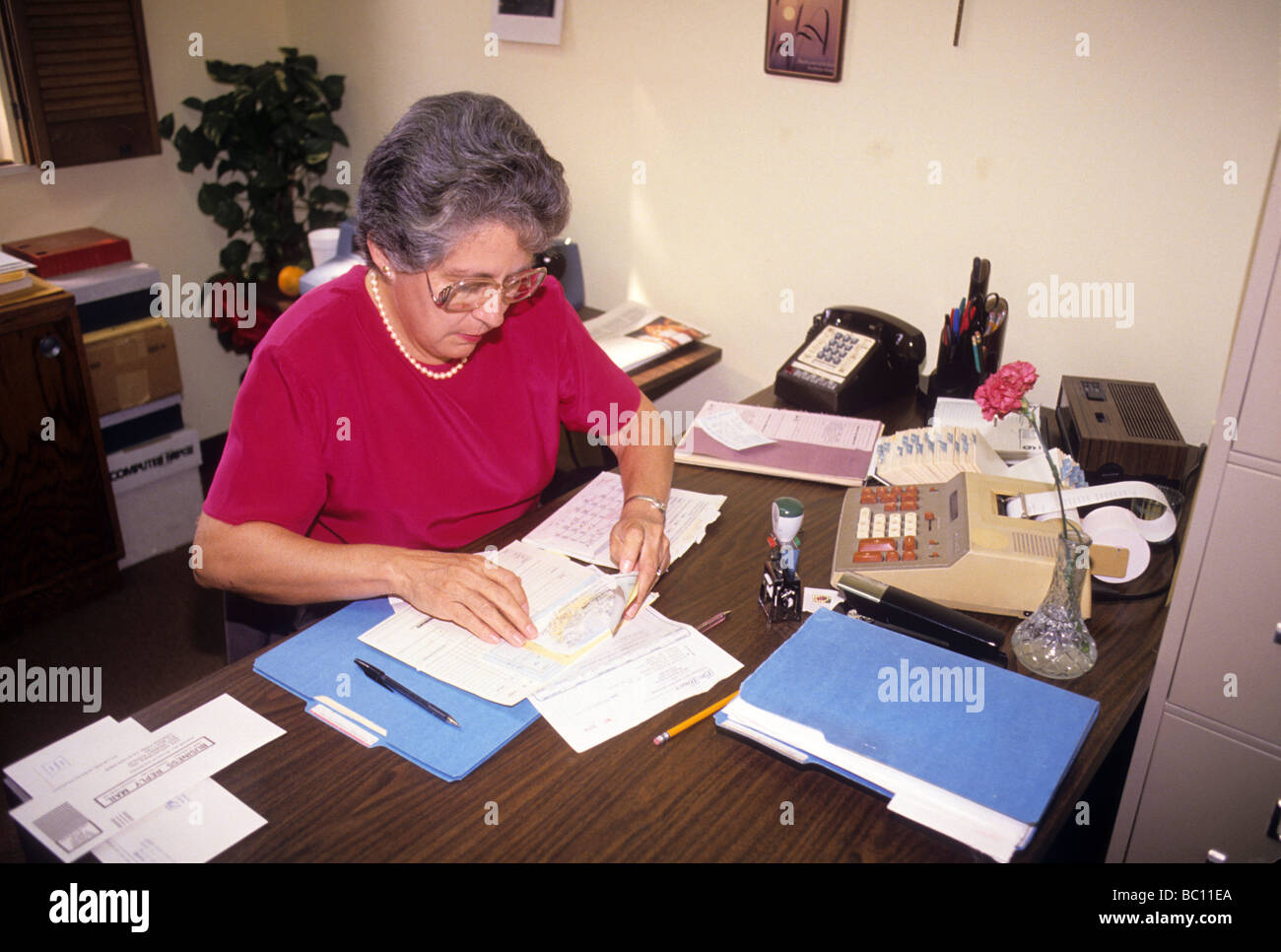 secretary bookkeeper desk office work woman female concentrate busy ...