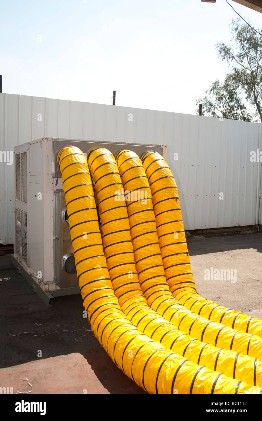 Yellow Air tubes from an air compressor Stock Photo - Alamy