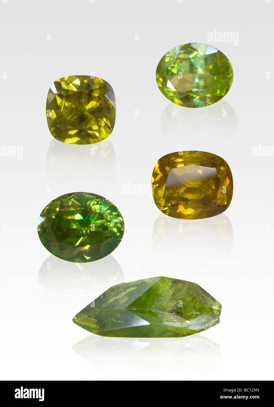Titanite gemstones and crystal specimen on white background Stock Photo ...