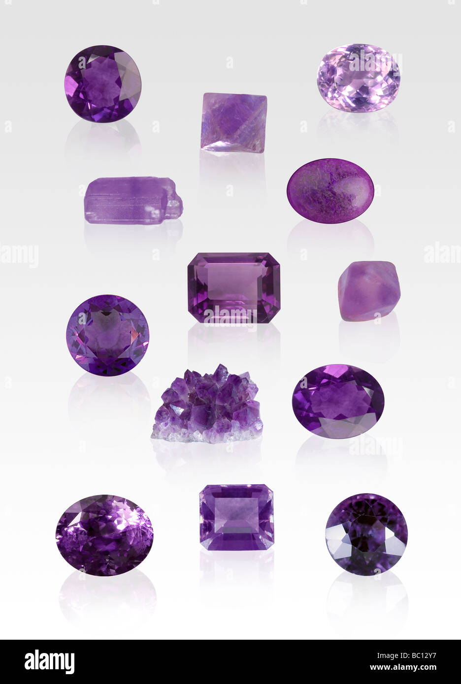 Violet Gemstones and Crystal specimens on white background Stock Photo ...