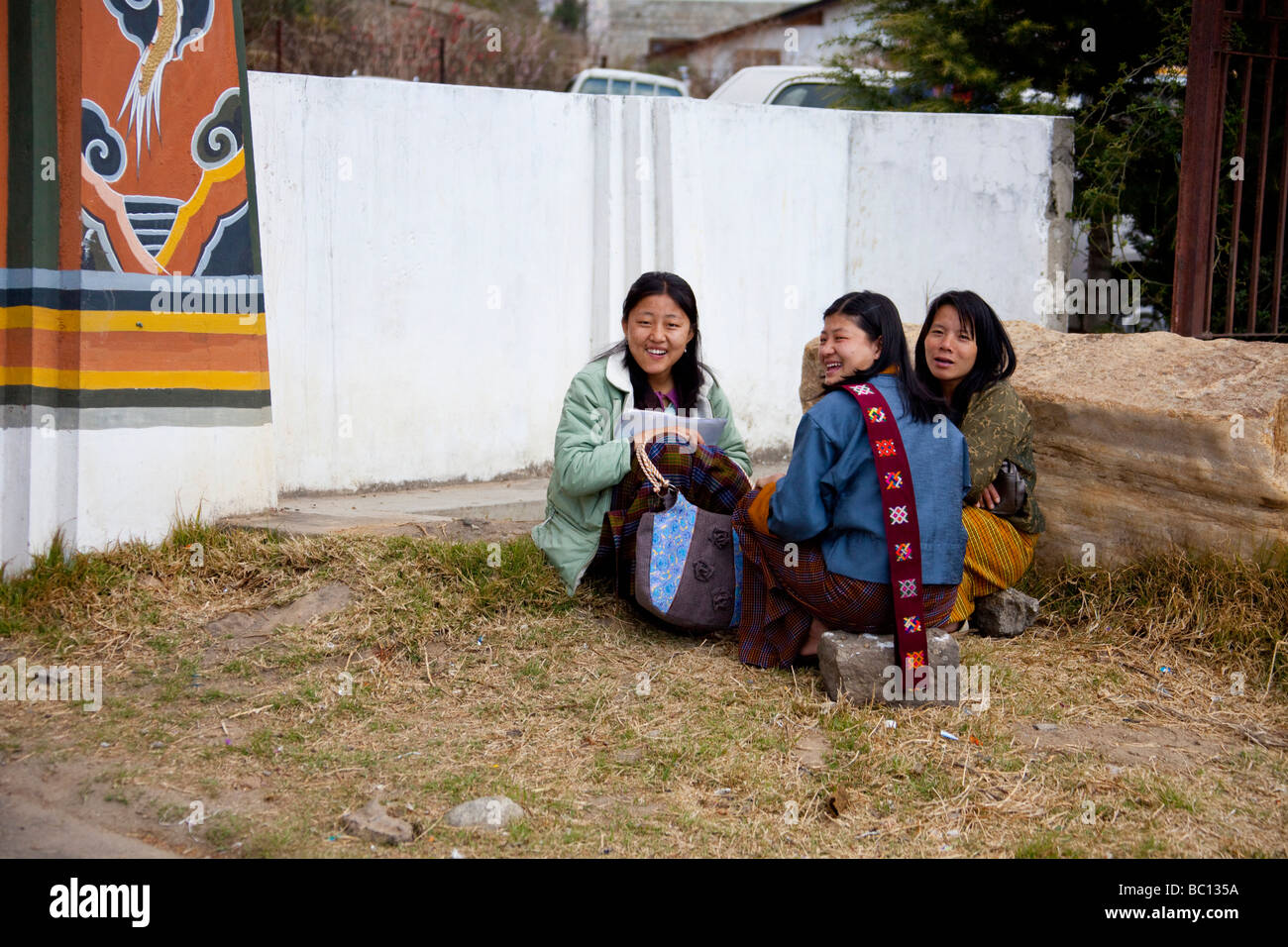 3 Butanese women sitting by side of road , Asia 91442 Bhutan-Thimphu ...