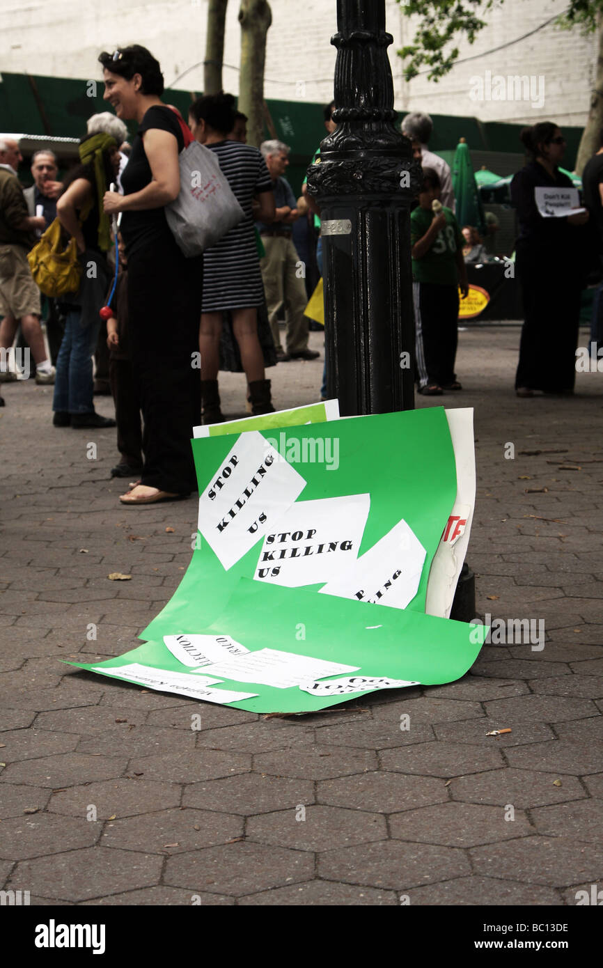 Sign laying on ground during protest against Iran in New York Stock ...